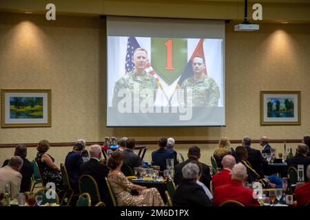 Command Sgt. Maj. Christopher Mullinax accepts the Lancer colors from ...