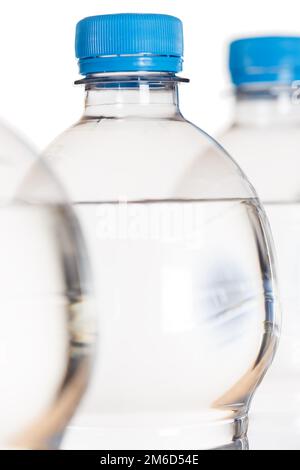Water bottle bottles portrait format isolated on white Stock Photo - Alamy