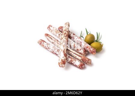 Flat lay of Spanish mini chorizo on yellow Stock Photo - Alamy