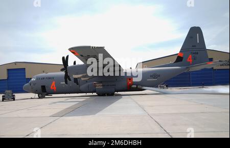 Aircrew from the 302nd Airlift Wing prepare for takeoff aboard a C-130 ...