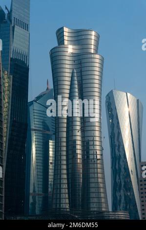 Modern glass fronted skyscrapers and office towers line the Doha ...