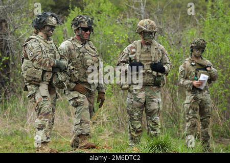 FORSCOM Command Sgt. Maj. Todd Sims talks with Roland Butler, a First ...