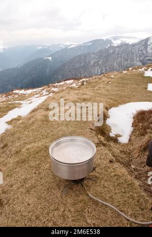 cooking in the mountains after a long hike Stock Photo - Alamy