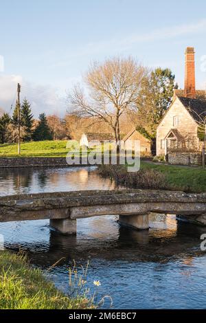 A vertical shot of the Lower Slaughter buildings in the Cotswolds ...