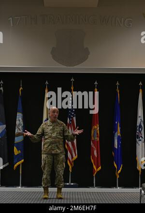 Lt. Gen. Robert Miller speaks with Sharene Brown, the wife of Air Force ...