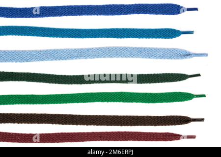 Collection of colored cotton laces for shoes Stock Photo - Alamy