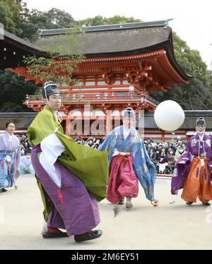 Kyoto, Japan, Jan. 4, 2023. People clad in traditional attire play ...