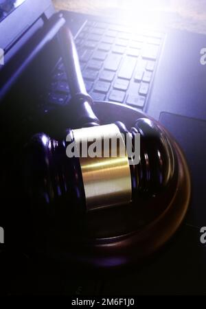 Court gavel on a computer keyboard Stock Photo - Alamy