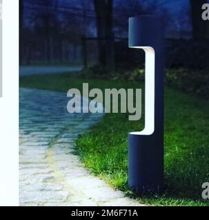 High pillar of street lighting Stock Photo - Alamy