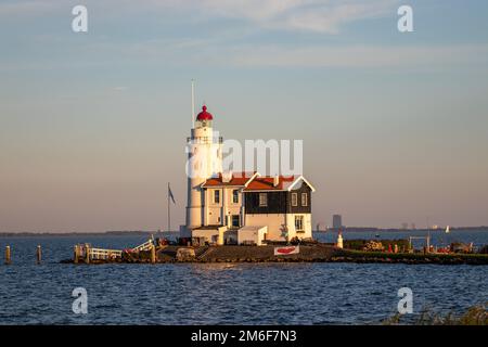 paard van marken lighthouse on marken island in golden hour with blue ...