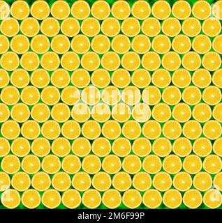 A slices of fresh juicy yellow lemons. Texture background Stock Photo ...