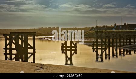The Lossiemouth wooden bridge to the East beach crosses the River ...