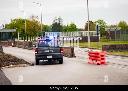 A patrol vehicle from the 423d Security Forces Squadron pursues a gate ...