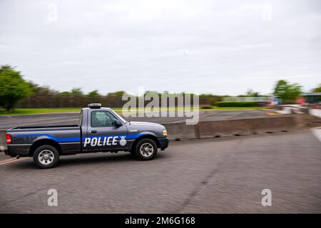 A patrol vehicle from the 423d Security Forces Squadron pursues a gate ...