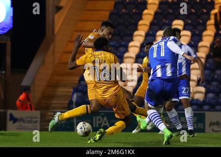 Ben Dickenson of Colchester United scores the opening goal, making it 1 ...