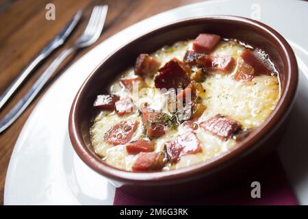 Grilled provolone. Provolone is an Italian cheese. It is an aged pasta ...