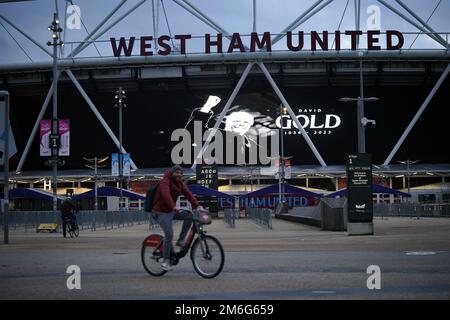 A tribute to David Gold on display on a TV screen at the London Stadium ...
