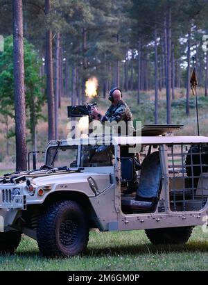 An enemy role player engages Special Forces candidates assigned to the ...