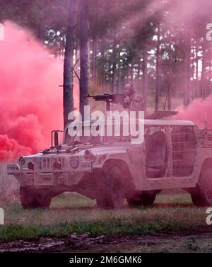 An enemy role player engages Special Forces candidates assigned to the ...
