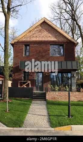 Typical American single family house frame under construction with ...