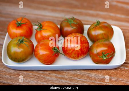 Tomato, red-striped tomatoes (Solanum lycopersicum) Red Zebra, special ...