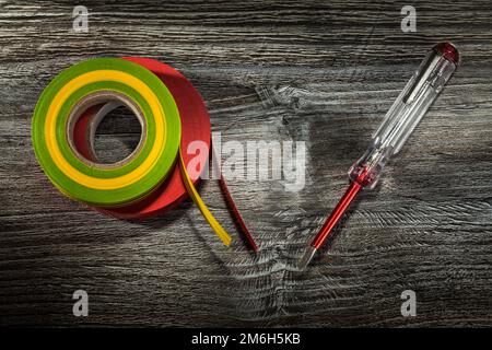 Insulated screwdriver on wooden board Stock Photo - Alamy