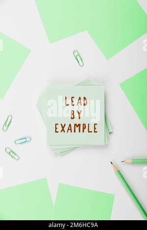 Text sign showing Lead By Example. Business photo text you become ...