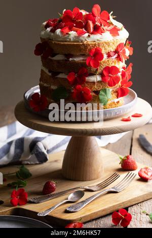 beautiful biscuit cake with strawberries decorated with natural ...