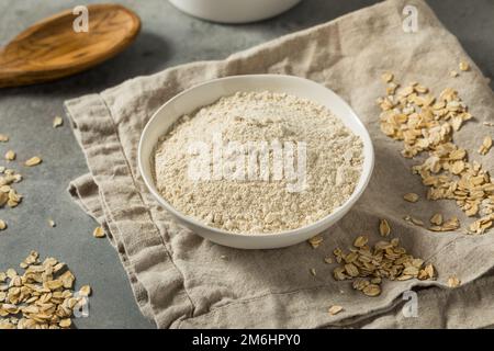Raw Organic White Oat Flour in a Bowl Stock Photo - Alamy