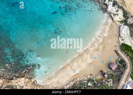 Photo from a flying drone, sandy beach by the sea on a sunny day in ...