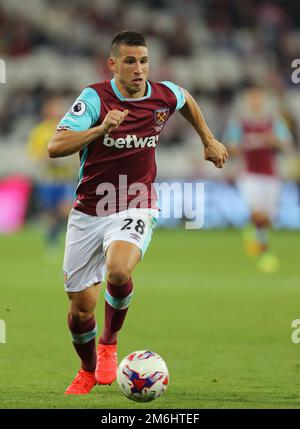 Jonathan Calleri of West Ham United gets away from Scott Brown of ...