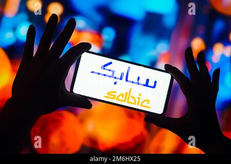 In this photo illustration, the SABIC logo is displayed on a smartphone ...