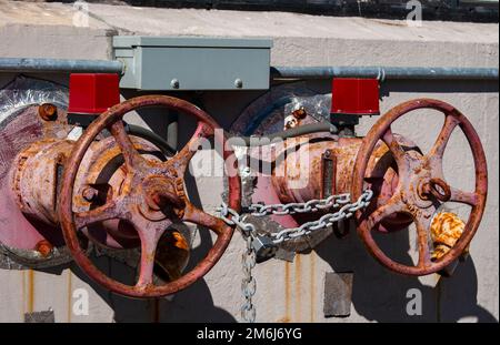 Rusty pipes, wheel and valves - 5 Stock Photo - Alamy