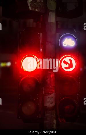 A traffic light system at a road intersection in operation Stock Photo ...