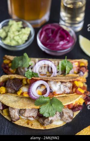 Mexican tortilla with nachos on slate Stock Photo - Alamy