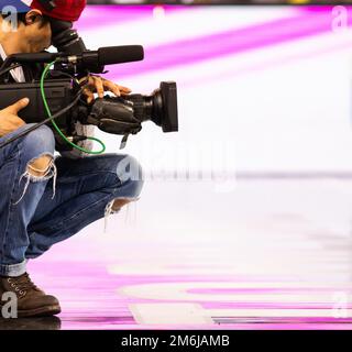 Filming media event or news conference with a video camera Stock Photo ...