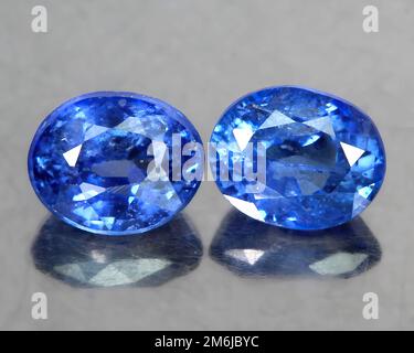 Natural beautiful stone kyanite on gray background Stock Photo - Alamy