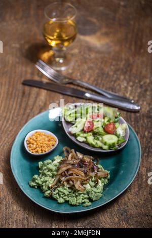 bavarian spinach spaetzle on wood Stock Photo - Alamy