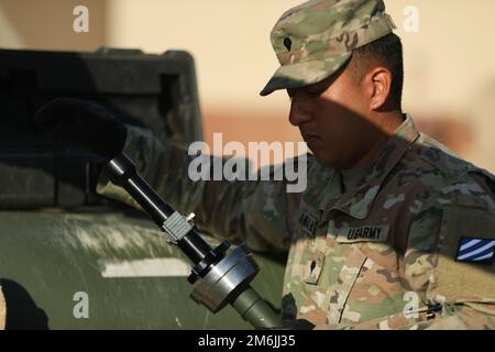 U.S. Army Spc. Alejandro Anguiano, an armored vehicle crewmember with ...