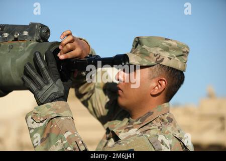 U.S. Army Spc. Alejandro Anguiano, an armored vehicle crewmember with ...