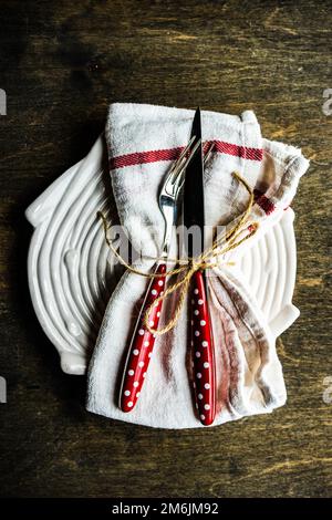 Vintage dinnerware served on wooden table Stock Photo - Alamy