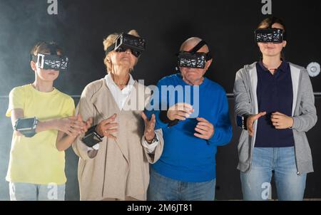 Family is looking for a way out of the quest room, going through ...