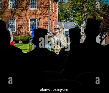 Army Reserve Sgt. Major James Voltoline shares a kiss with his wife ...