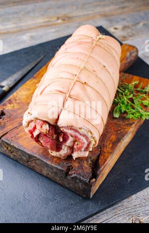Traditional raw Filipino lechon kawali pork belly roll meat as piece ...