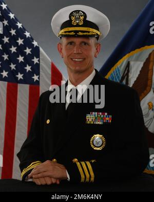Navy Talent Acquisition Group Nashville’s Command Master Chief Jeffrey Hineman poses for an ...