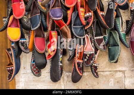 Set of traditional hand made leather shoes in a bazaar Stock Photo - Alamy