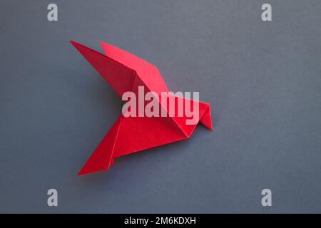 Red paper dove origami isolated on a blank white background Stock Photo ...