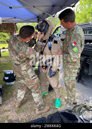 Two NBC defense soldiers in protective gear, pictured during ...