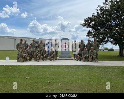 Two NBC defense soldiers in protective gear, pictured decontaminating a ...