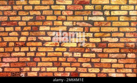 A brick wall, made of treated, antique-styled brick. High quality ...